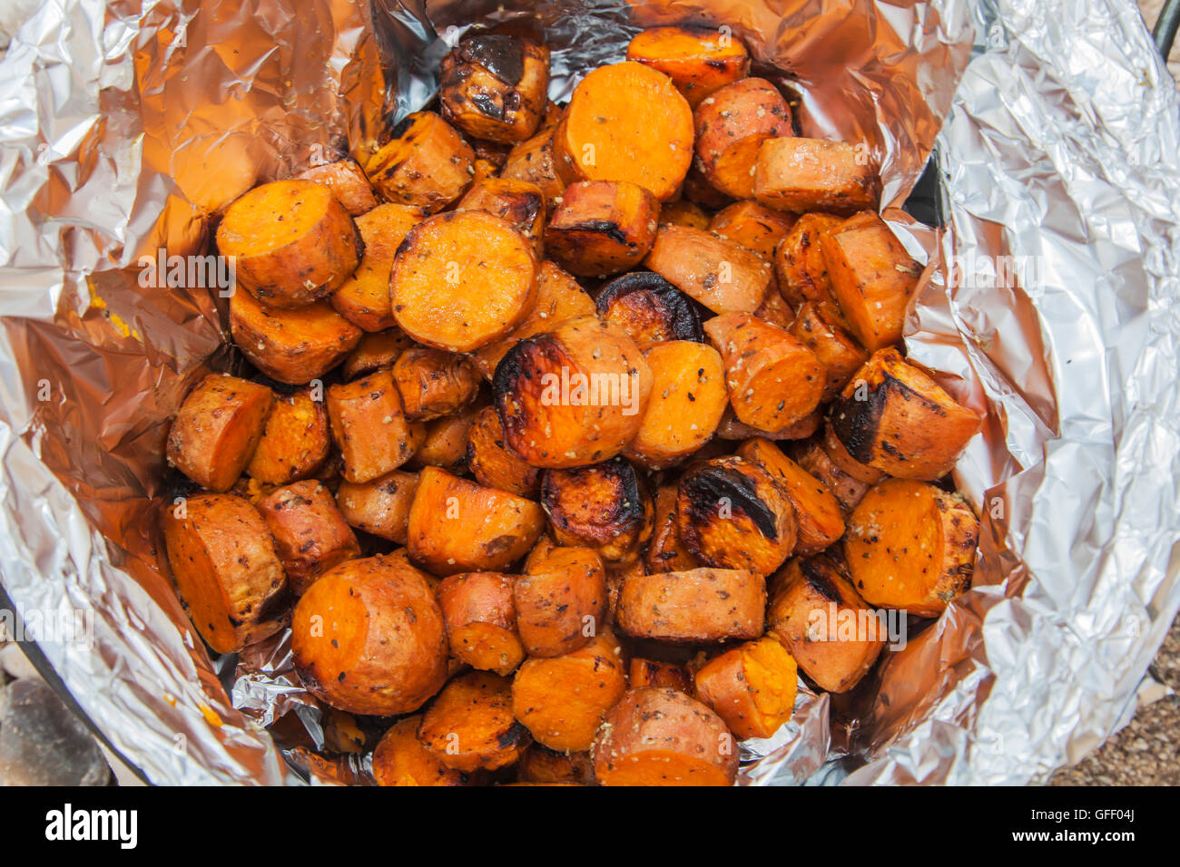 A view from above of a cut sweet potato in a pot of Poyke Stock Photo ...