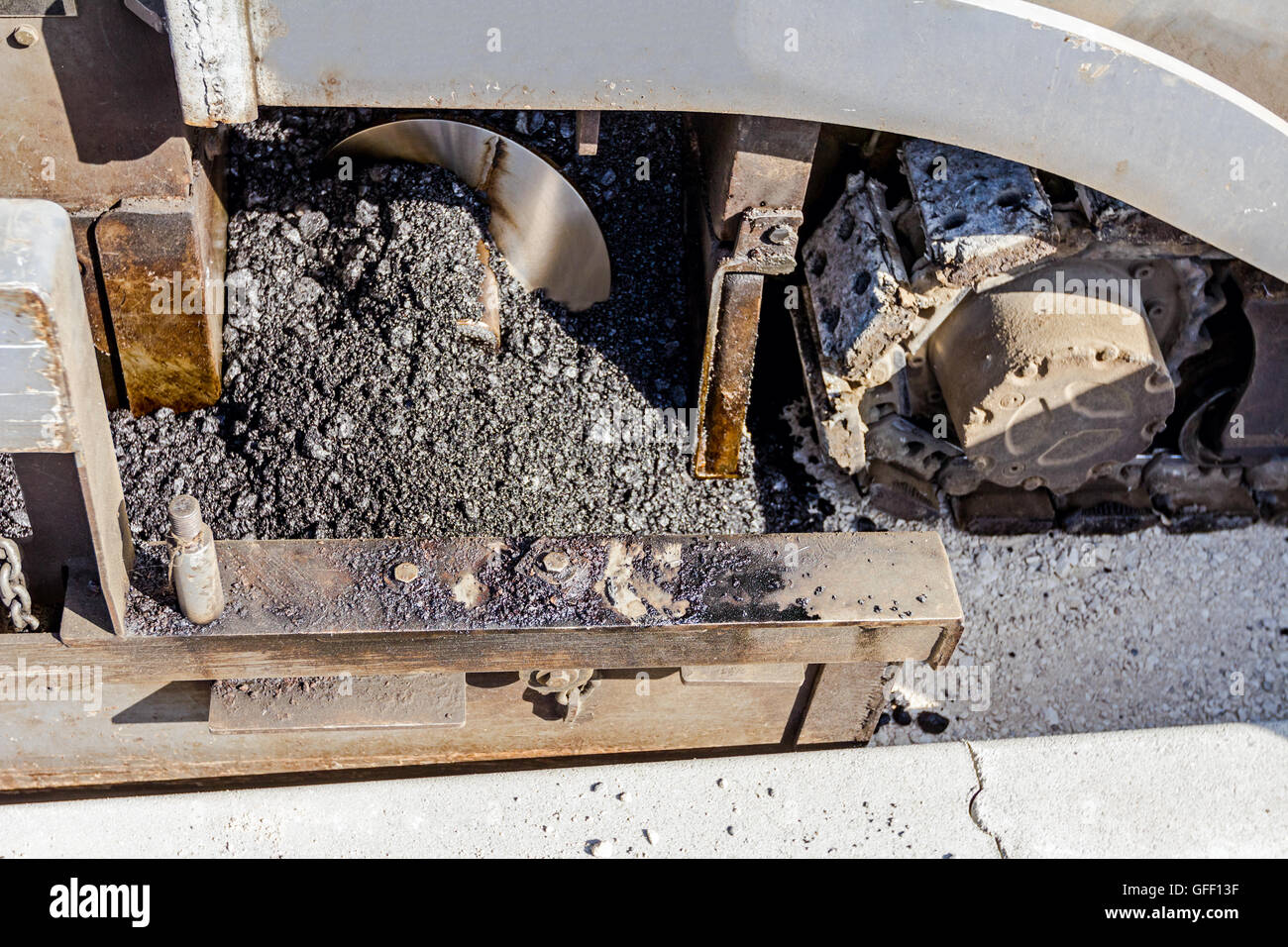 Detail of industrial machinery working with asphalt. Tarmac road laying ...