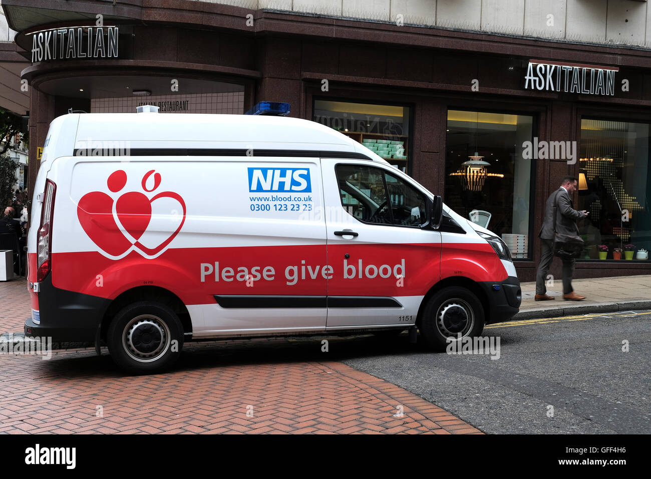 An NHS Blood transfusion service van parked up on a city street Stock ...