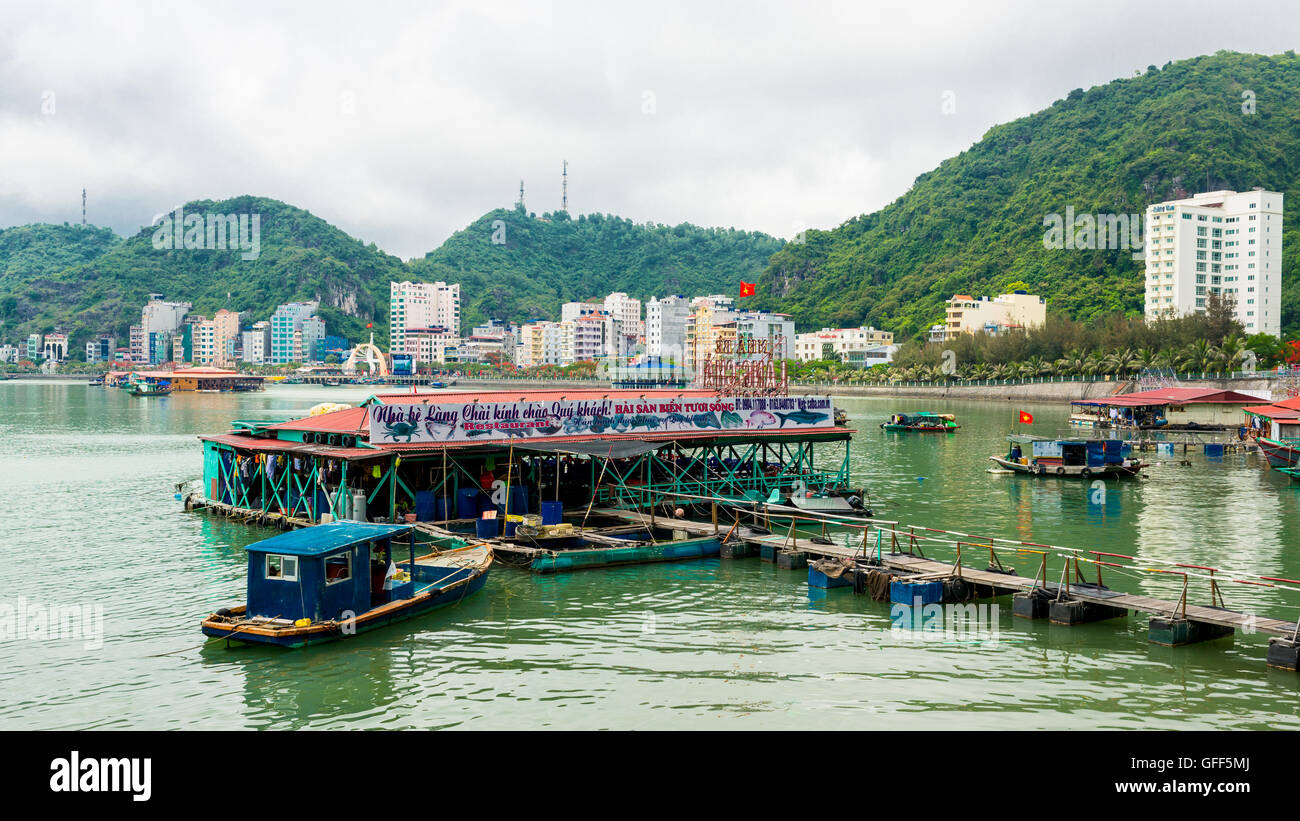 View of a floating restaurant in front of Cat Ba town Stock Photo - Alamy