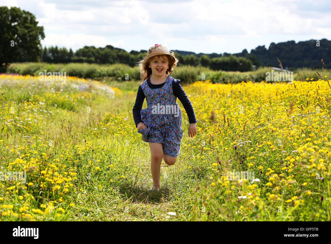A young girl enjoying the hot weather this Summer at the English ...