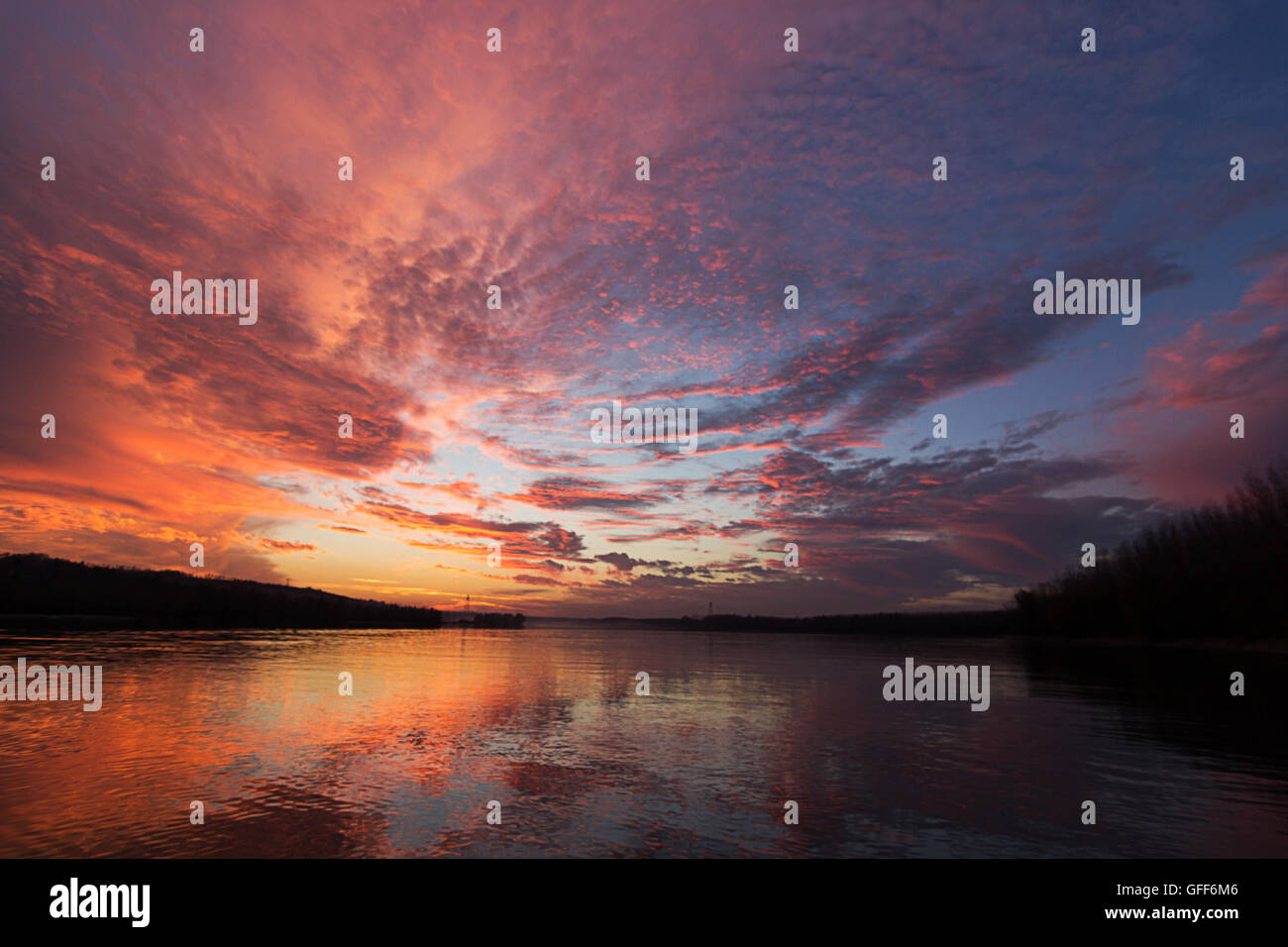 Dramatic Sunset sky reflection Stock Photo - Alamy