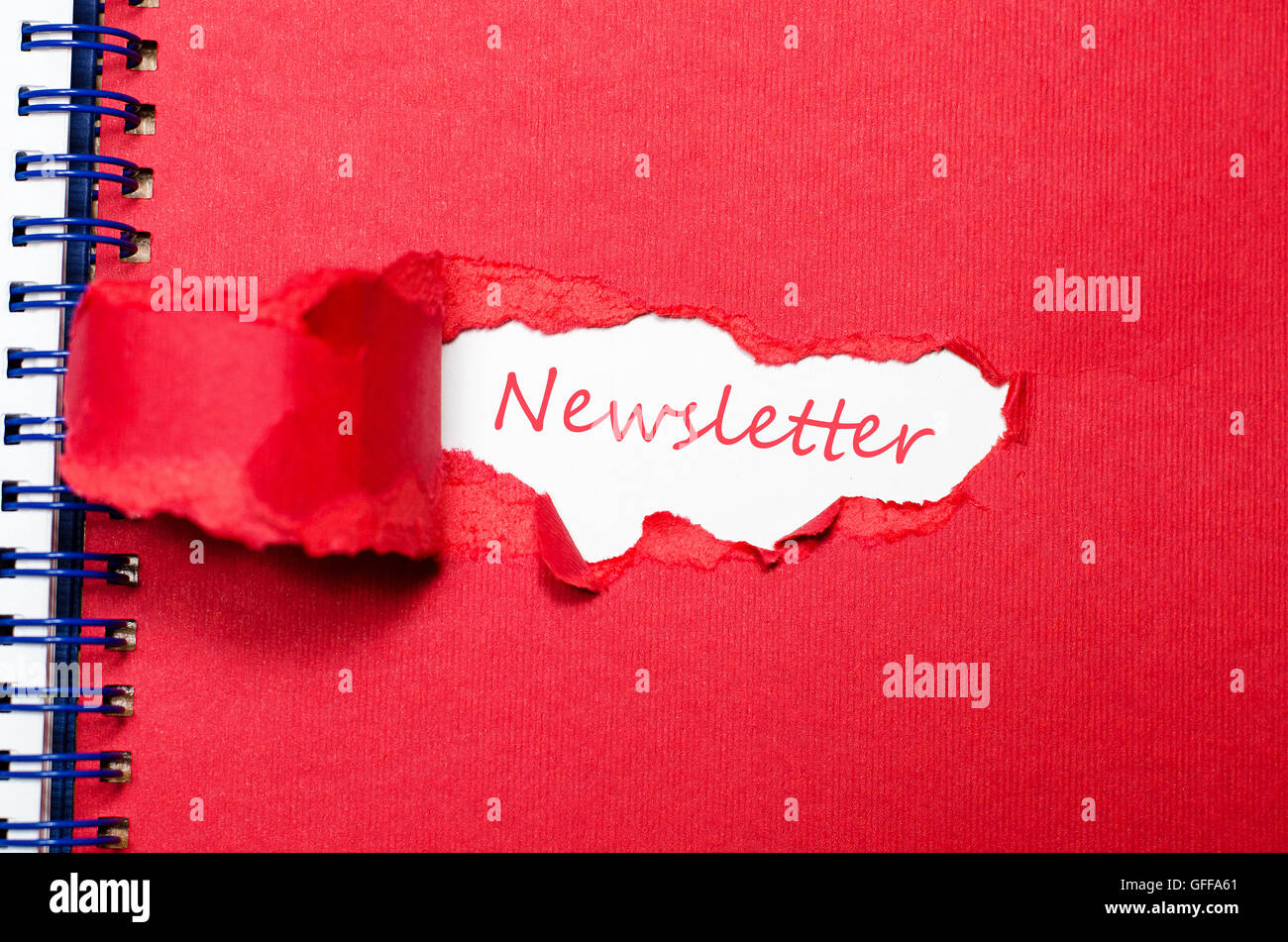 The word newsletter appearing behind torn paper Stock Photo - Alamy