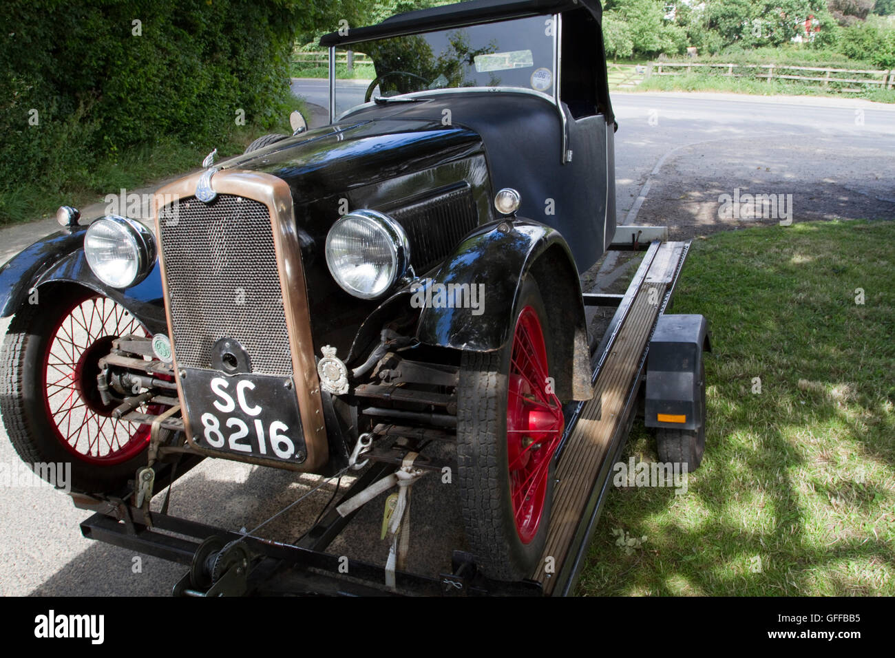 On a trailer a 1930s three wheeled BSA light car Stock Photo - Alamy