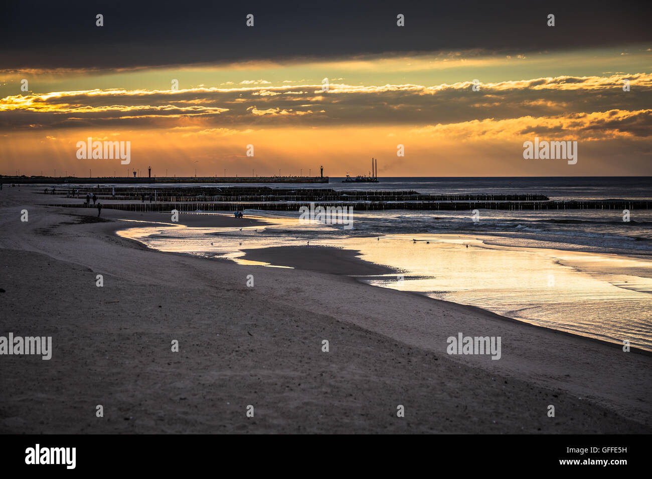 Sunset on the beach in Leba, Baltic Sea, Poland Stock Photo - Alamy