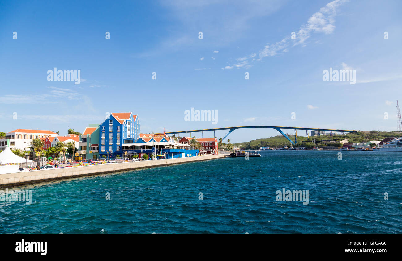 Colorful Curacao and Blue Bridge over harbor Stock Photo - Alamy