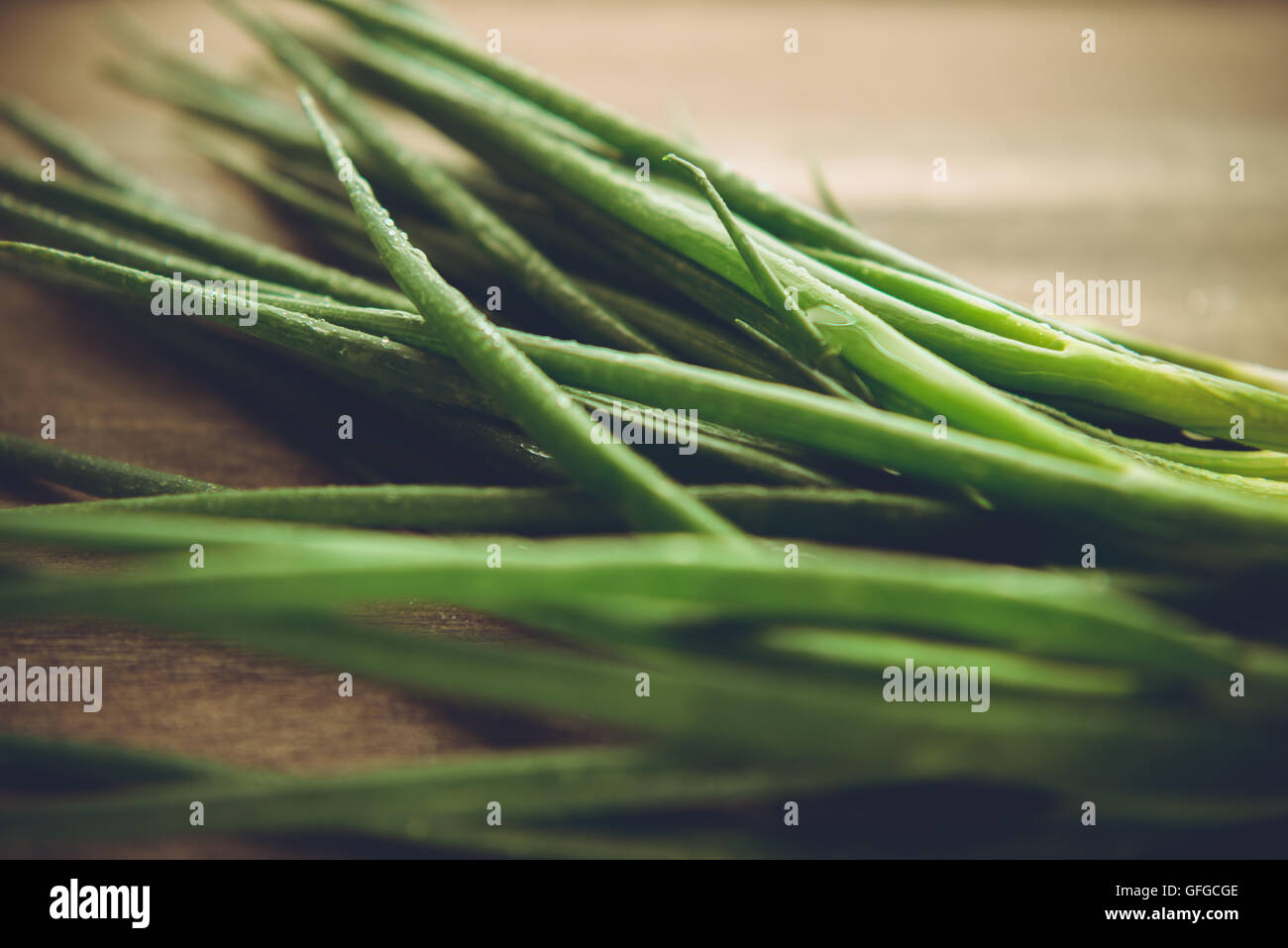 A bunch of fresh spring onions shot on studio surface Stock Photo - Alamy