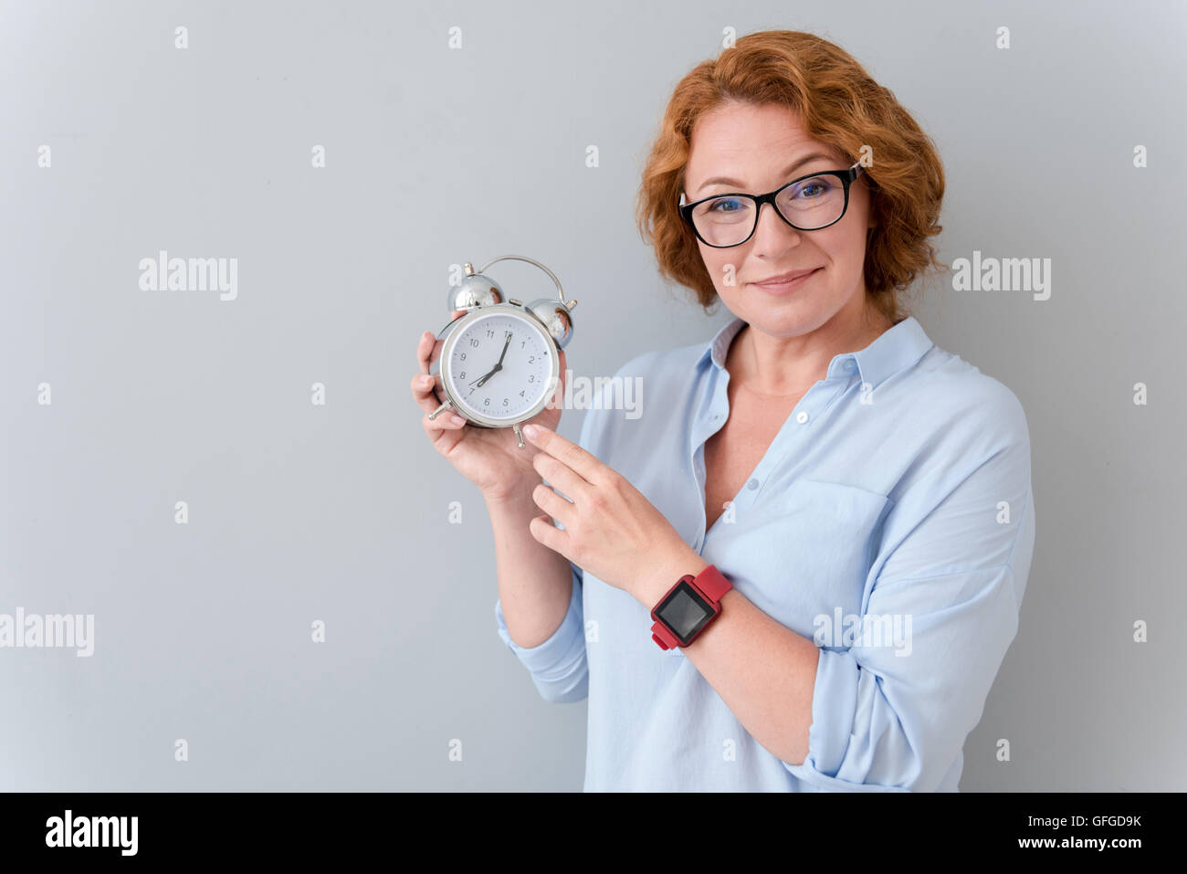 Woman digital alarm clock hi-res stock photography and images - Alamy