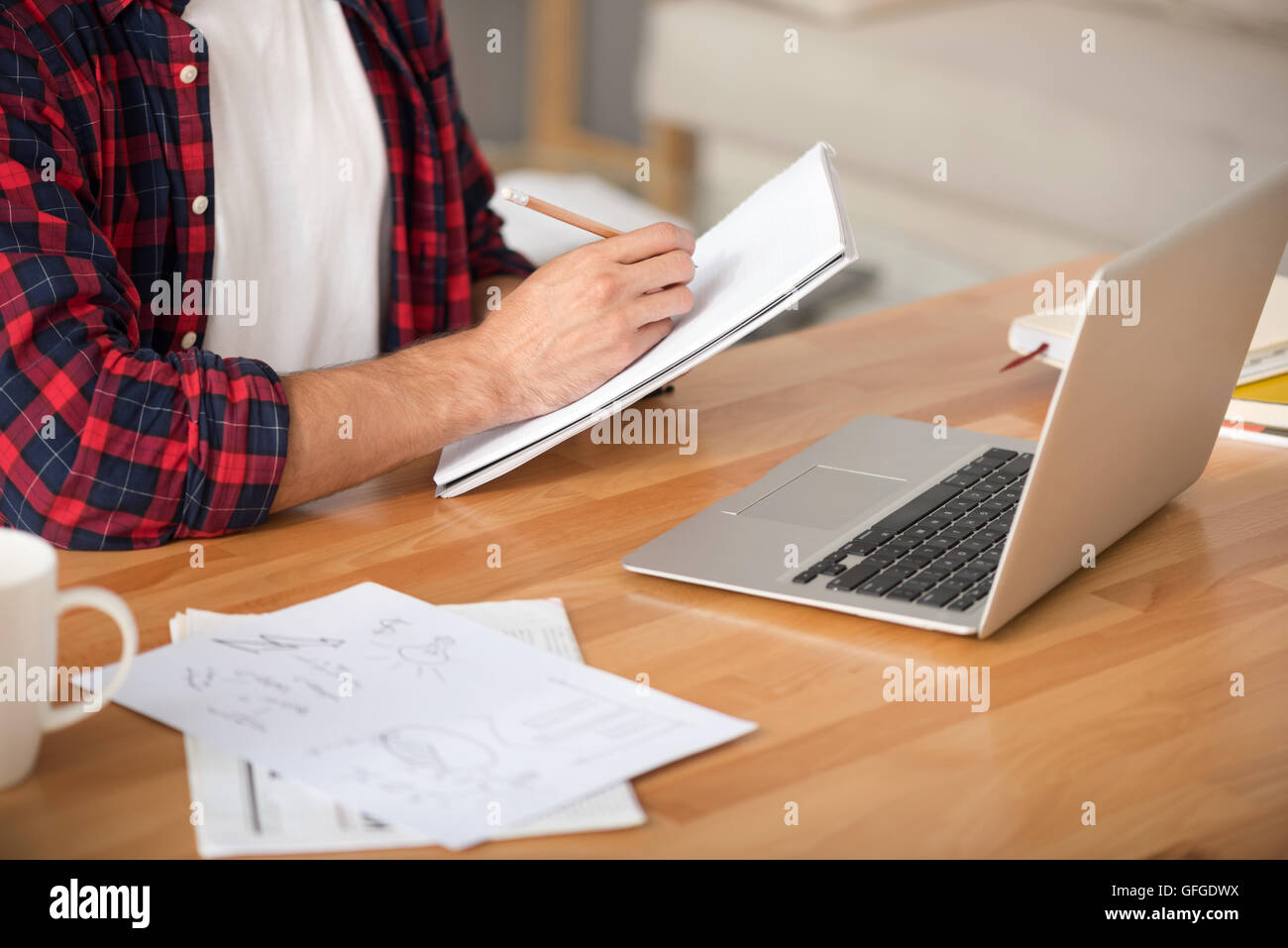 Pleasant man making notes hi-res stock photography and images - Alamy