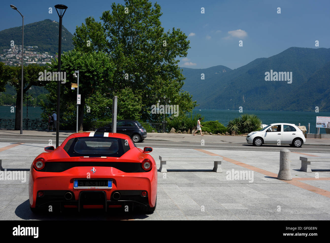 Ferrari in street outside a shopping area Stock Photo - Alamy