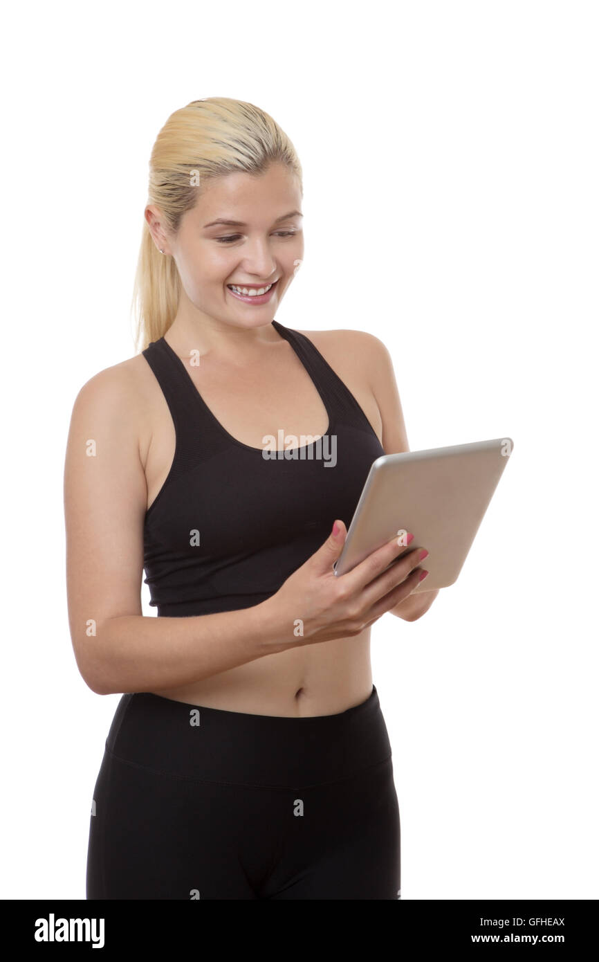 happy fitness woman using a tablet Stock Photo - Alamy