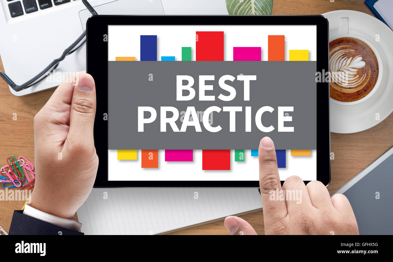 BEST PRACTICE , on the tablet pc screen held by businessman hands ...