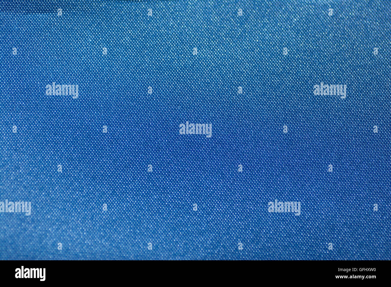 Blue shinny fabric in full frame Stock Photo - Alamy