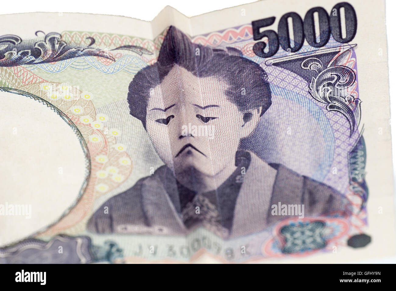 Sad face on Japanese 5000 yen bill, Ichiyo Higuchi Stock Photo - Alamy