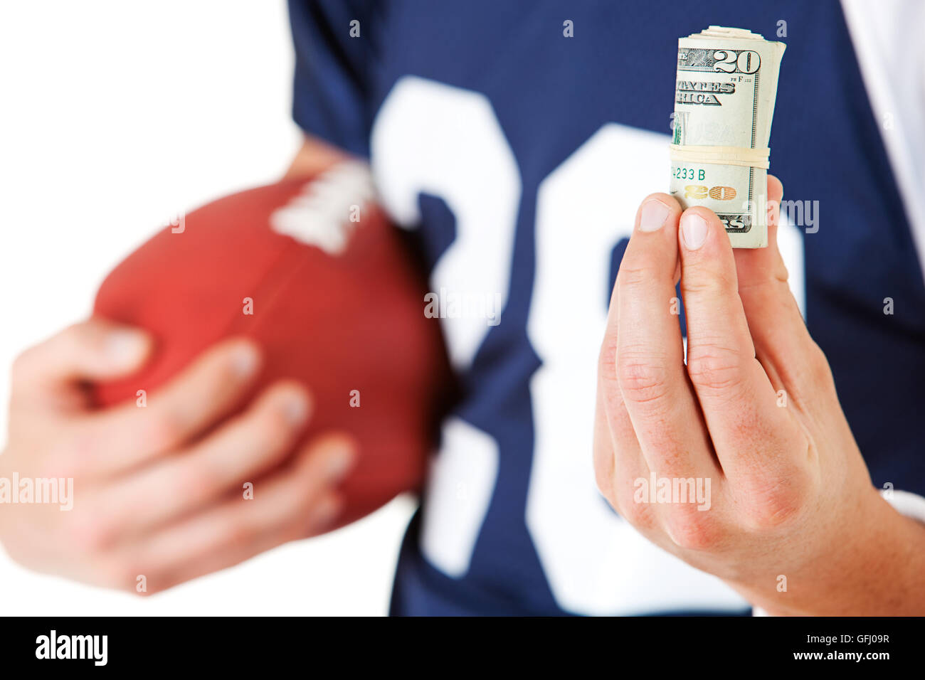 Football player holding money hi-res stock photography and images - Alamy