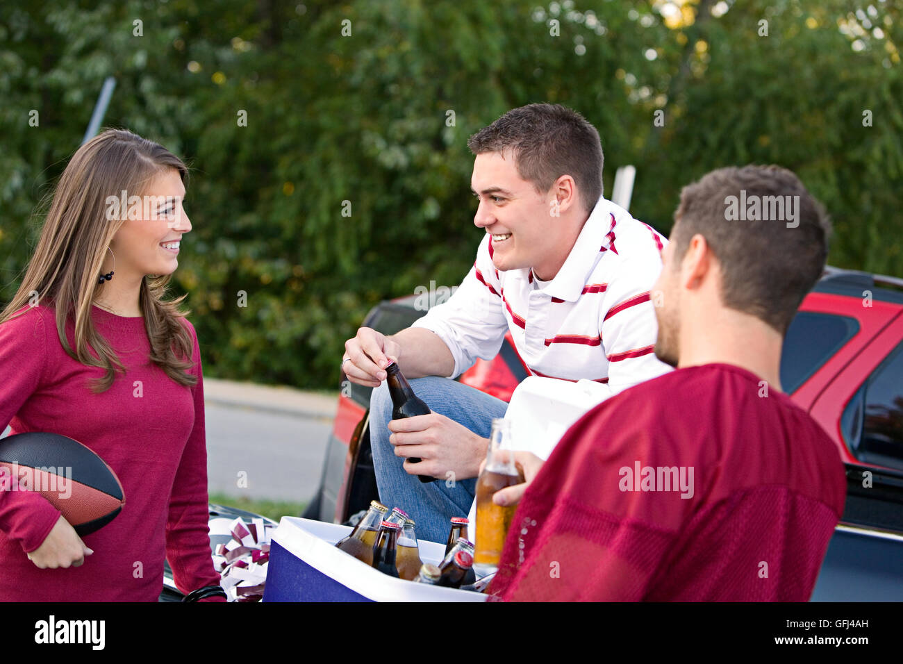 Series with college football fans tailgating and having fun before the ...