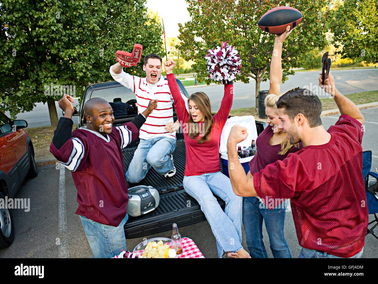 Series with college football fans tailgating and having fun before the ...