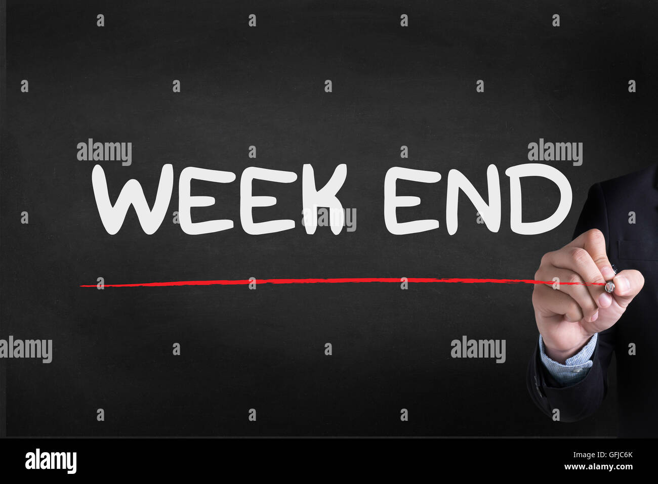 WEEK END Businessman drawing Landing Page on blackground Stock Photo ...