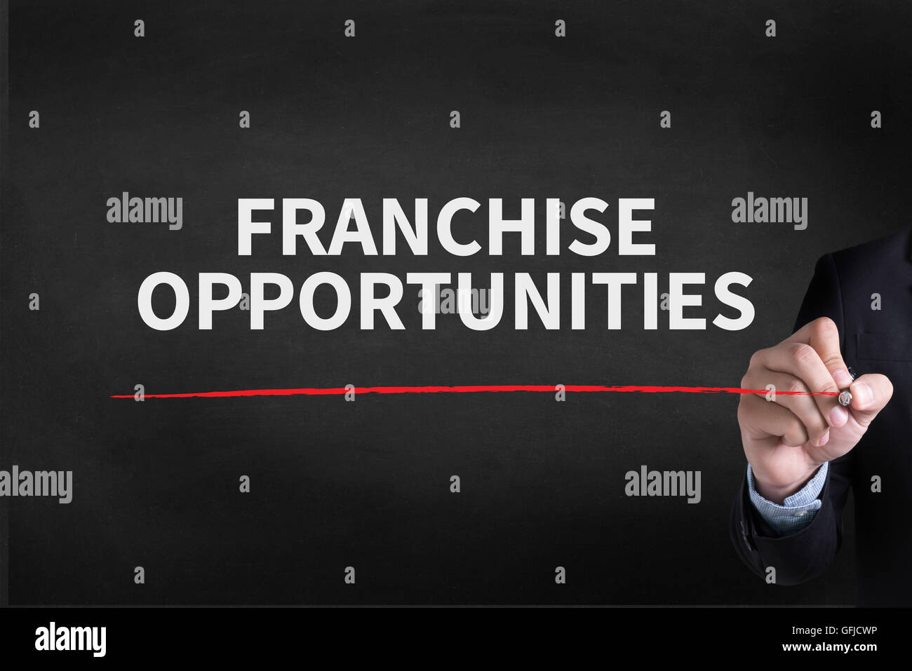 FRANCHISE OPPORTUNITIES Businessman drawing Landing Page on blackground ...