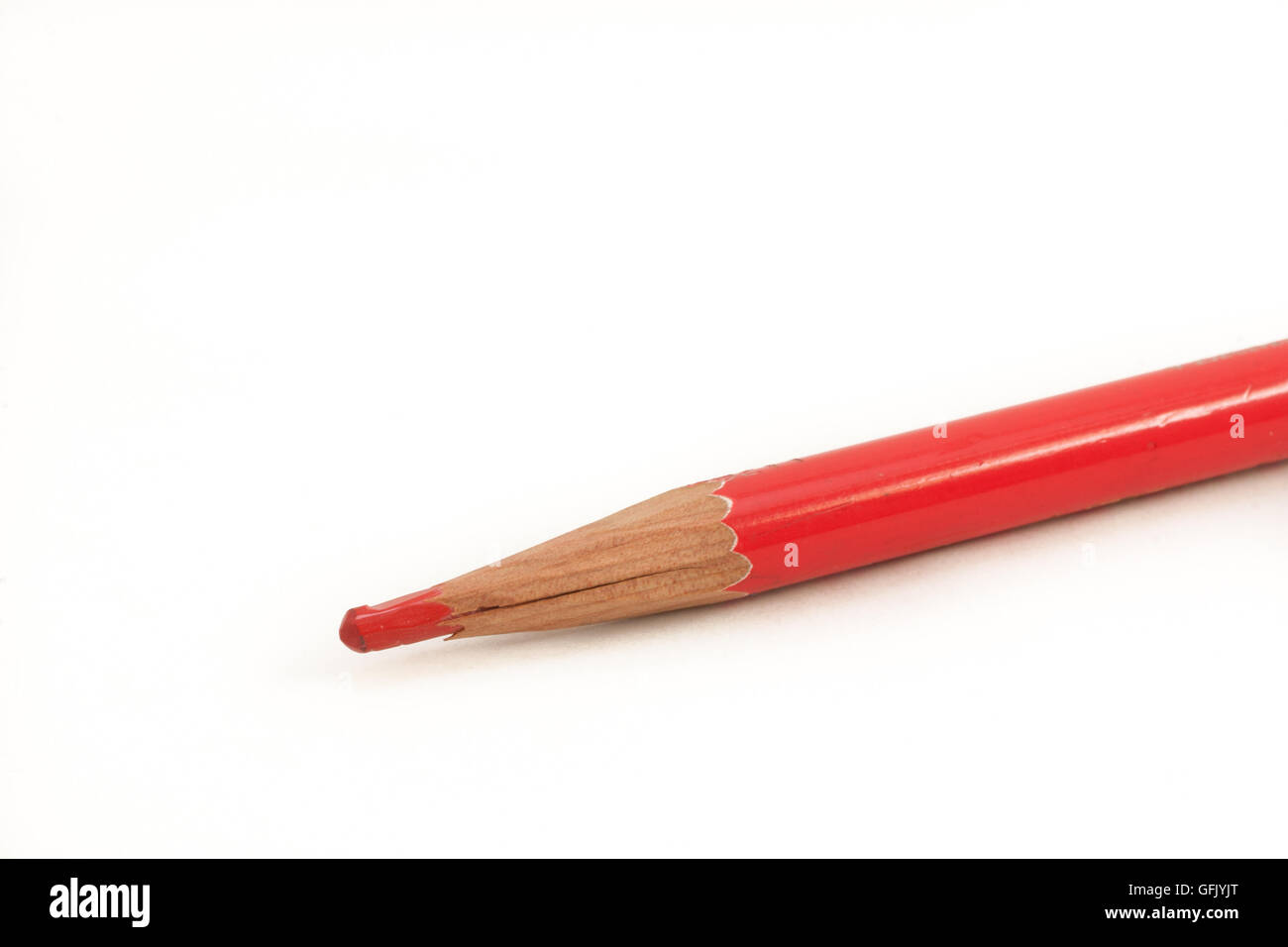 Red pencil on white isolated background Stock Photo - Alamy
