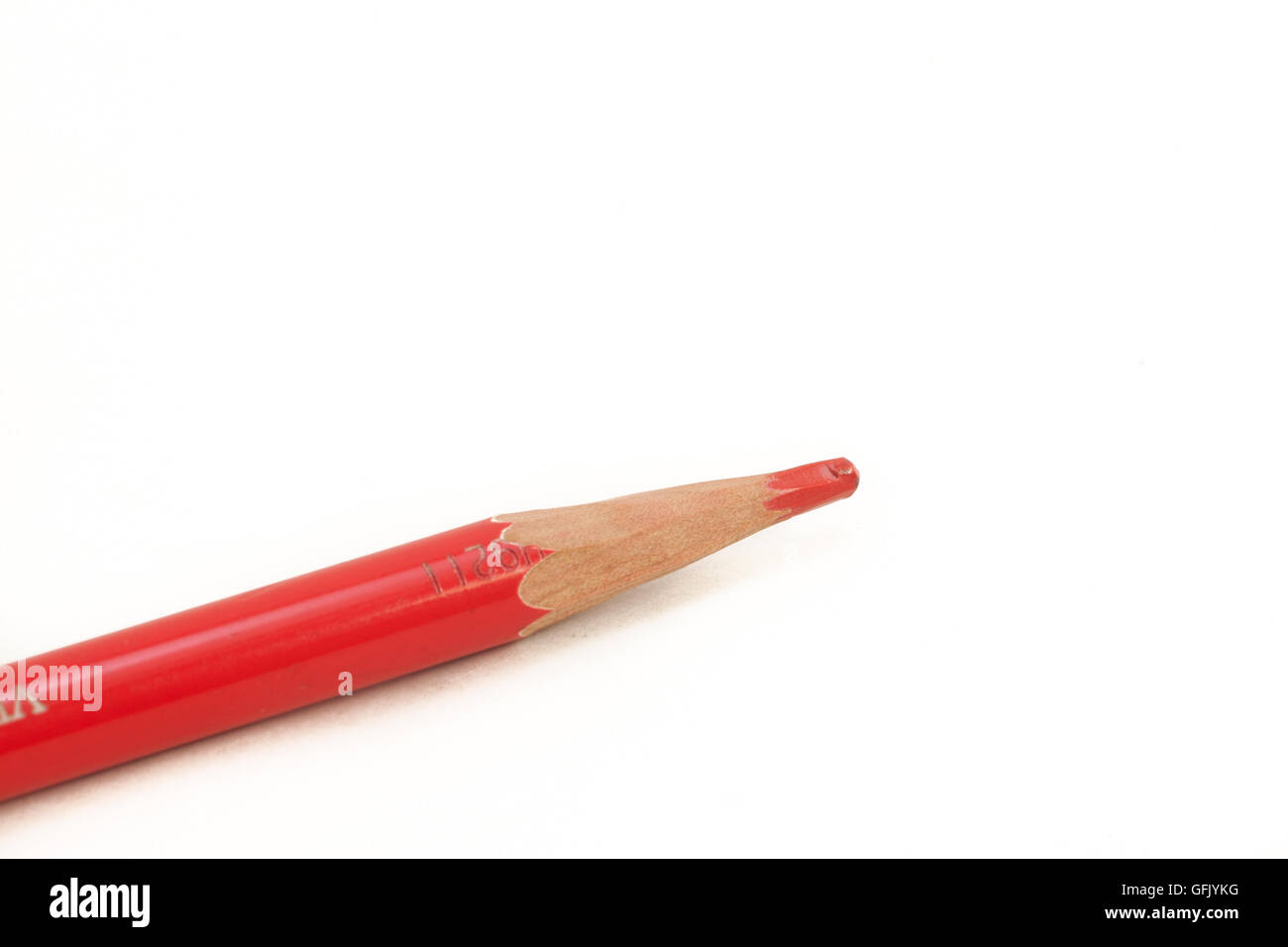 Red pencil on white isolated background Stock Photo - Alamy