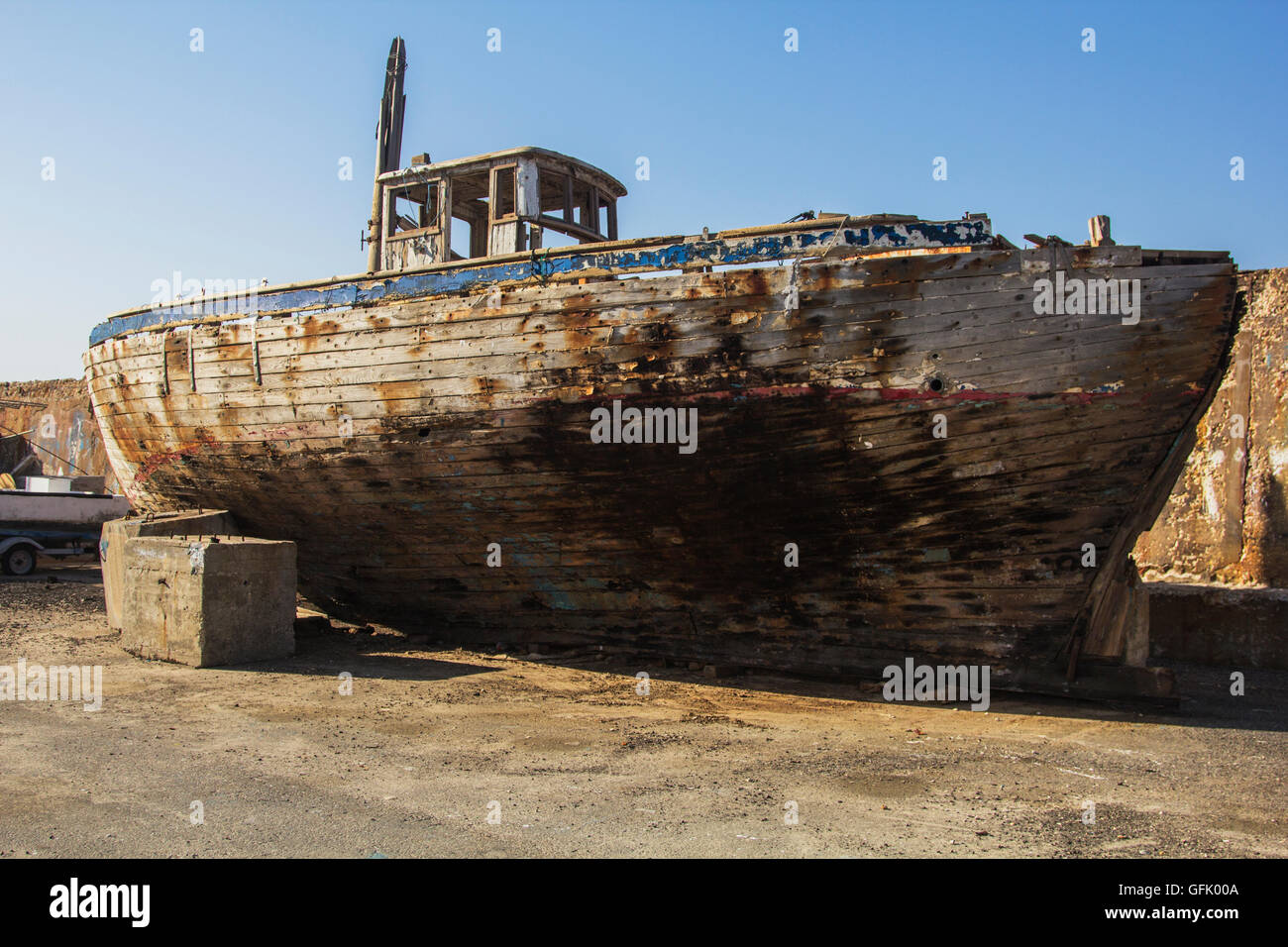 There is an abandoned old ship full of rust and mold on the inland port ...