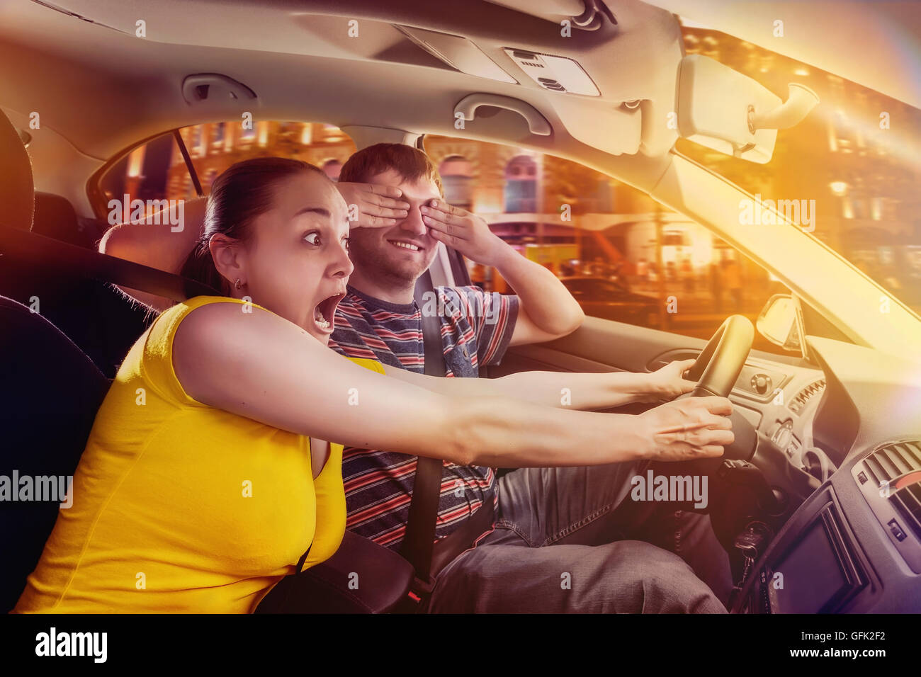 Couple driving in the car Stock Photo - Alamy