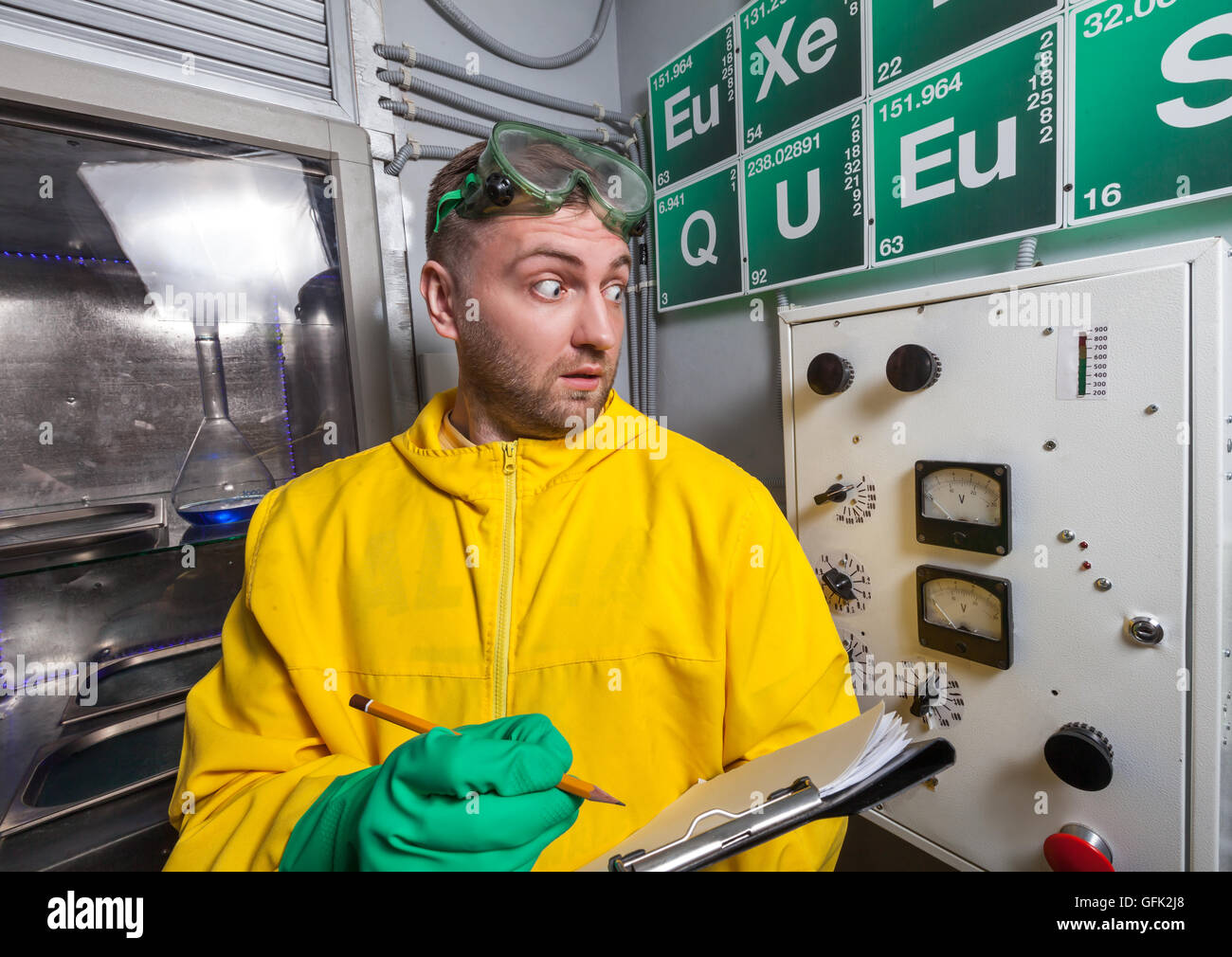 Man in the lab making notes Stock Photo - Alamy