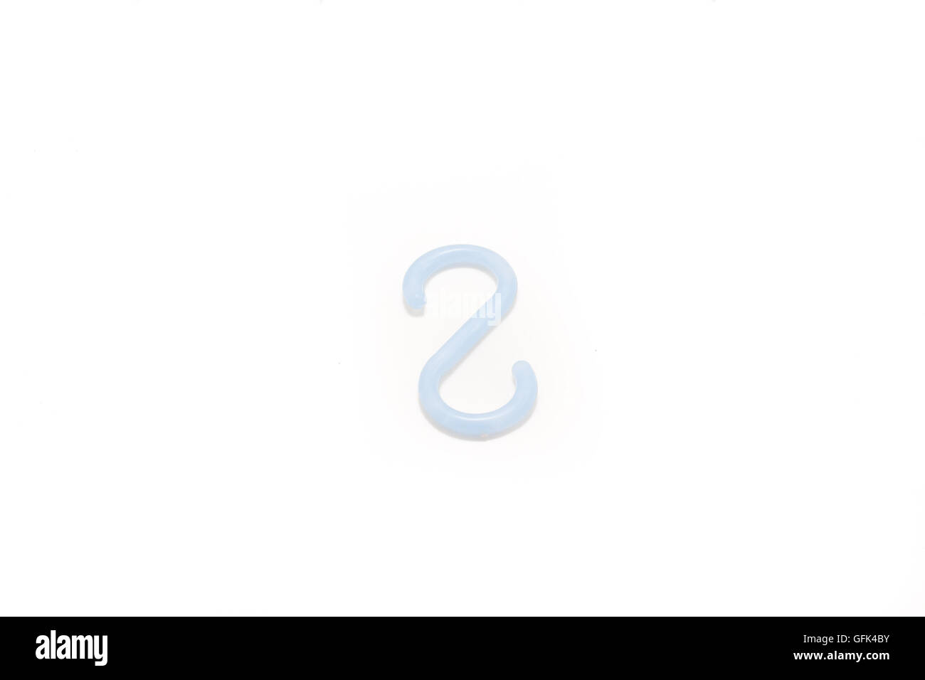 Plastic S shaped hook on white isolated background Stock Photo - Alamy