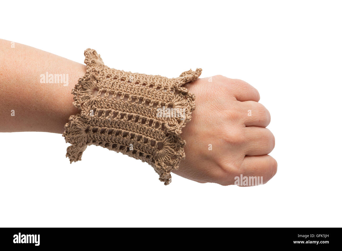 Brown handmade band on womans hand Stock Photo - Alamy
