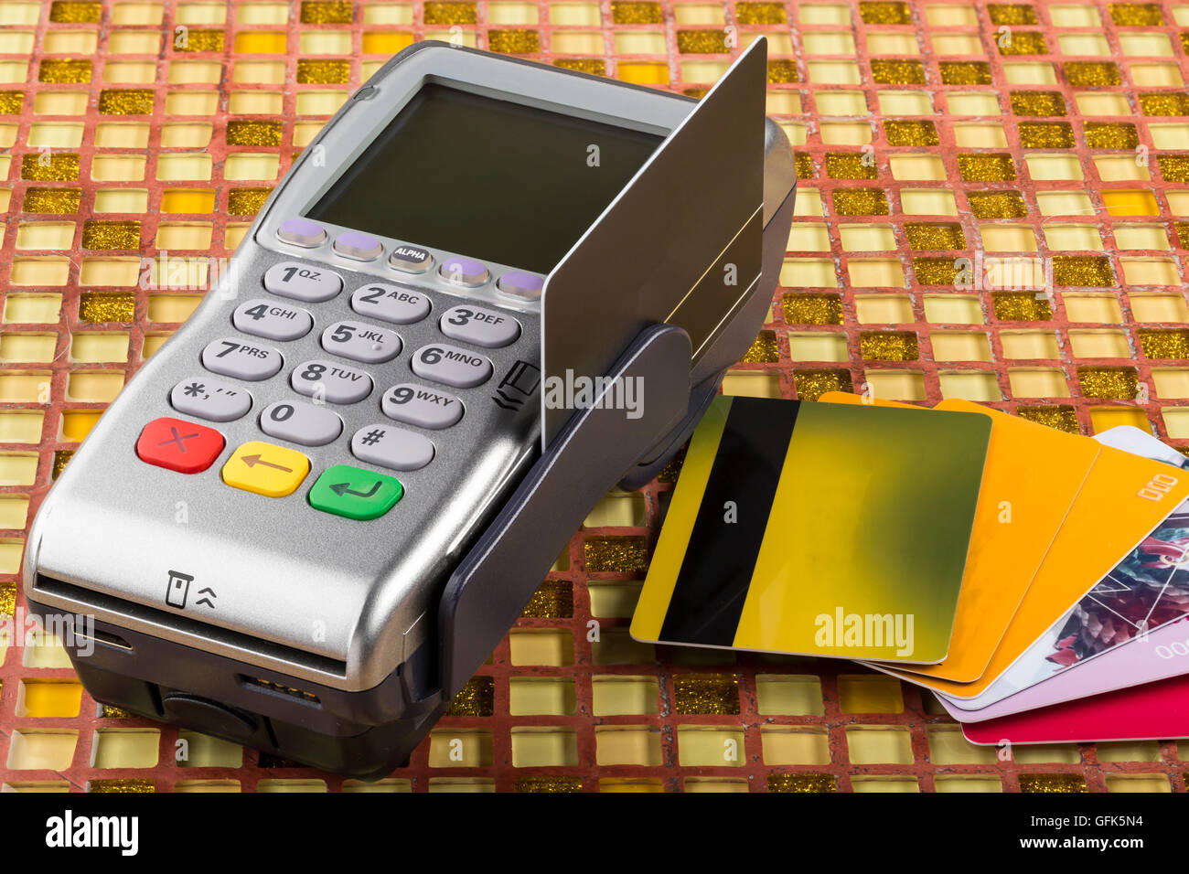 Wireless payment mobile gprs terminal and stack of plastic card Stock ...
