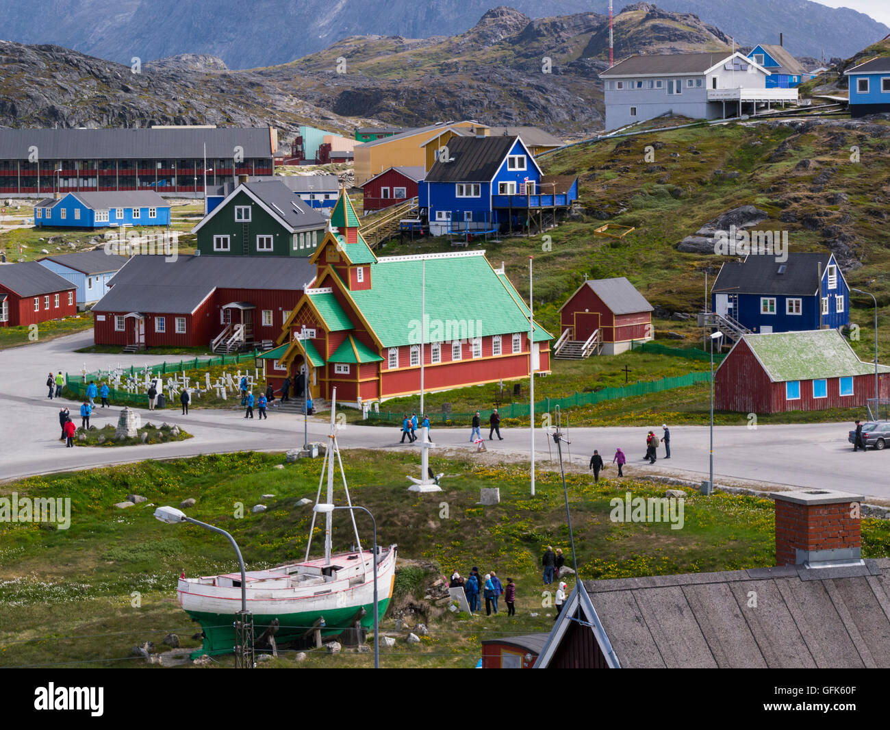 Tourists walking around picturesque town Paamiut located at mouth of ...
