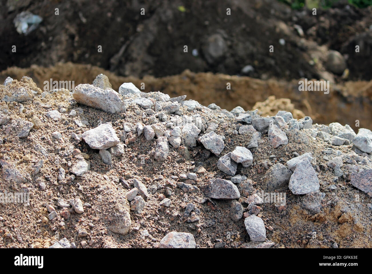 granite stones, sand and earth, dug during the extraction of peat on ...