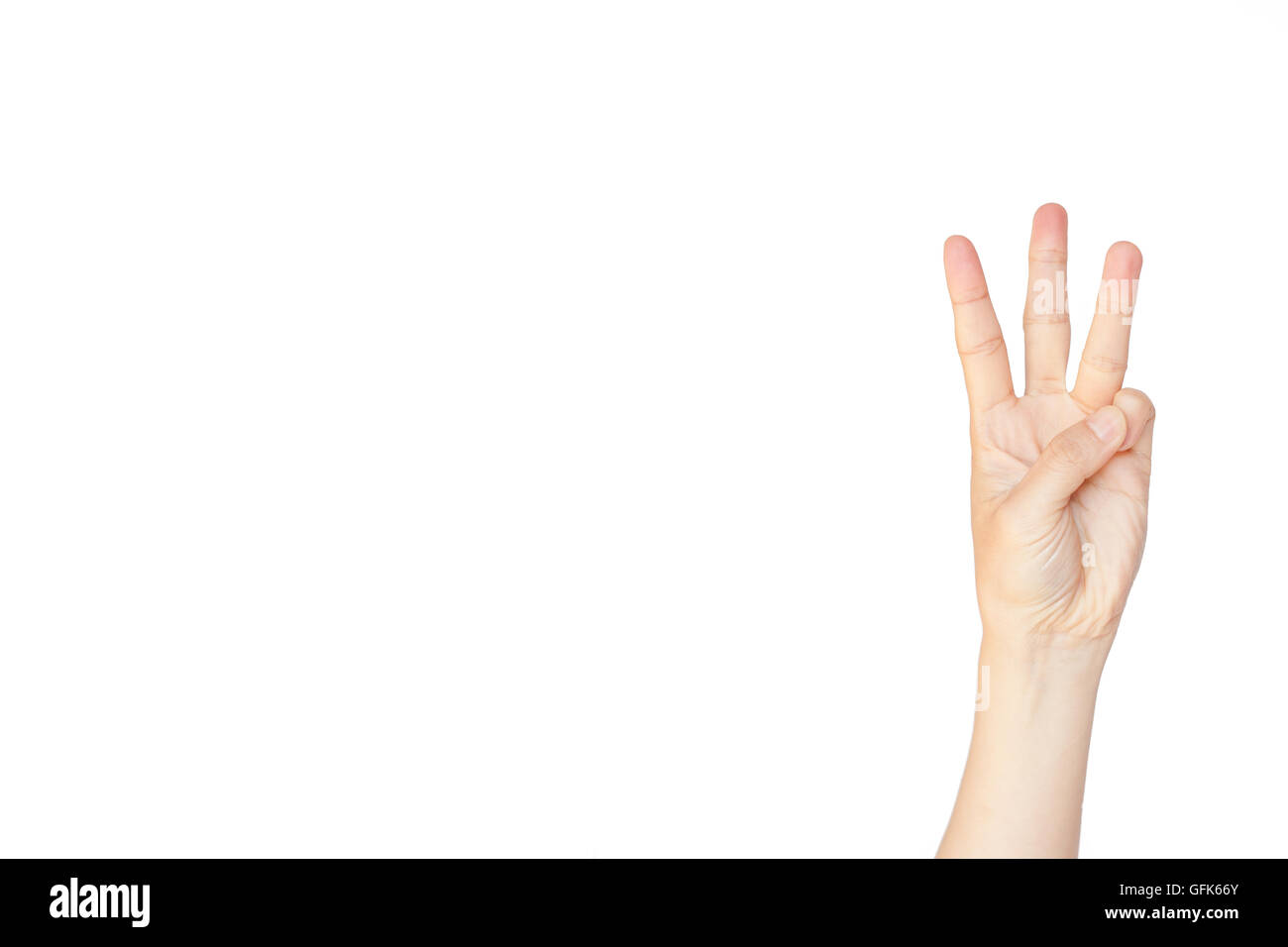 Japanese hand gesture: Number three on white isolated background Stock Photo - Alamy