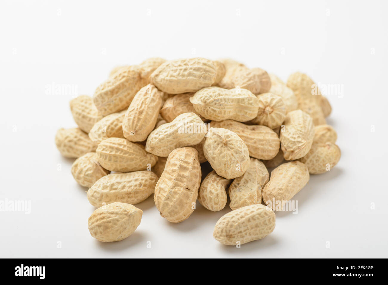 peanuts on the white background Stock Photo - Alamy