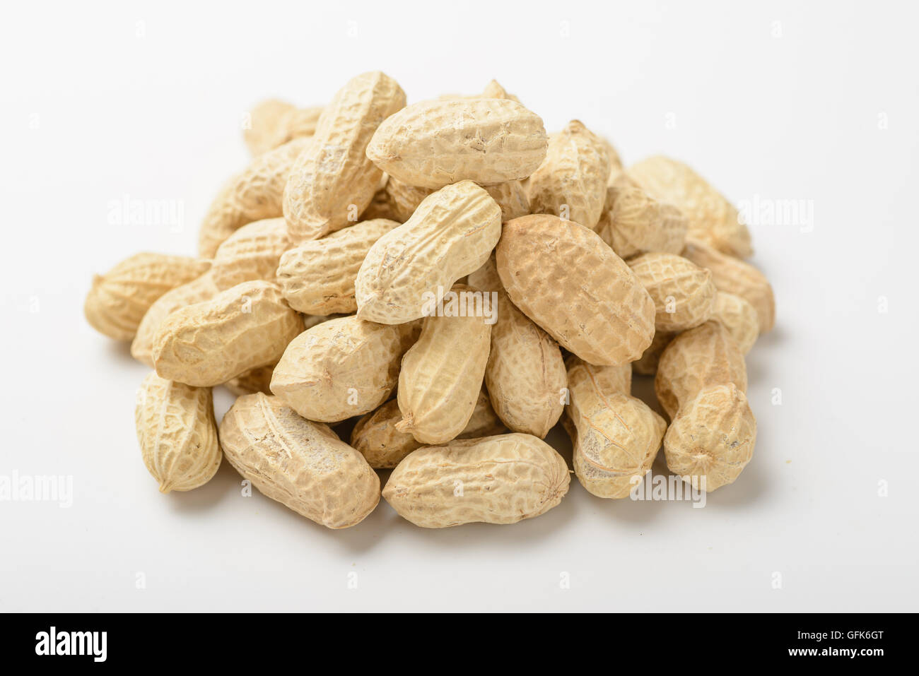 peanuts on the white background Stock Photo - Alamy