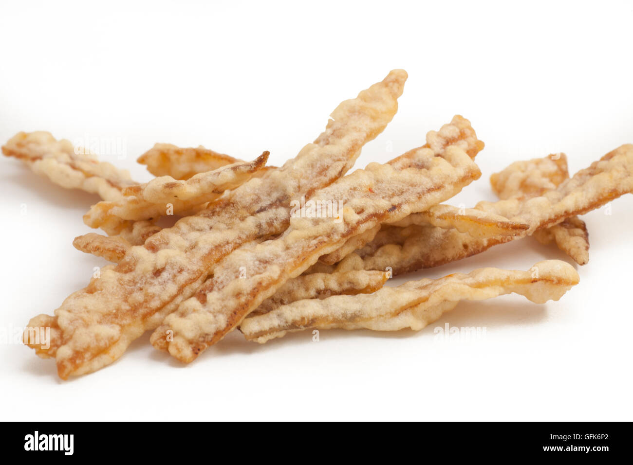 Japanese fried squid snack on white isolated background Stock Photo - Alamy