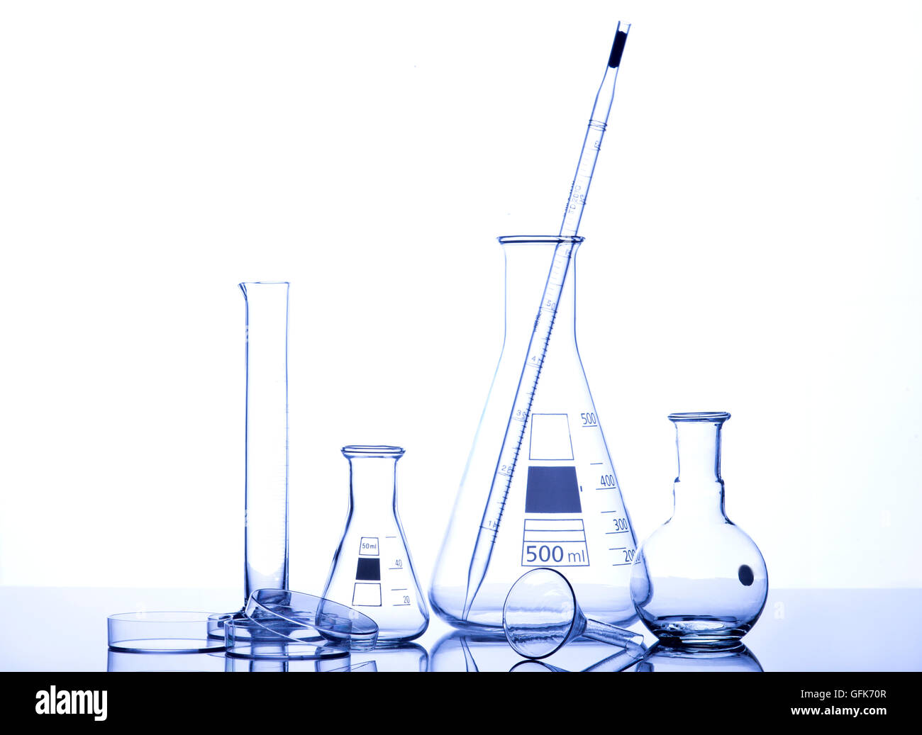 Test-tubes with reflections on a white and blue background. Laboratory ...
