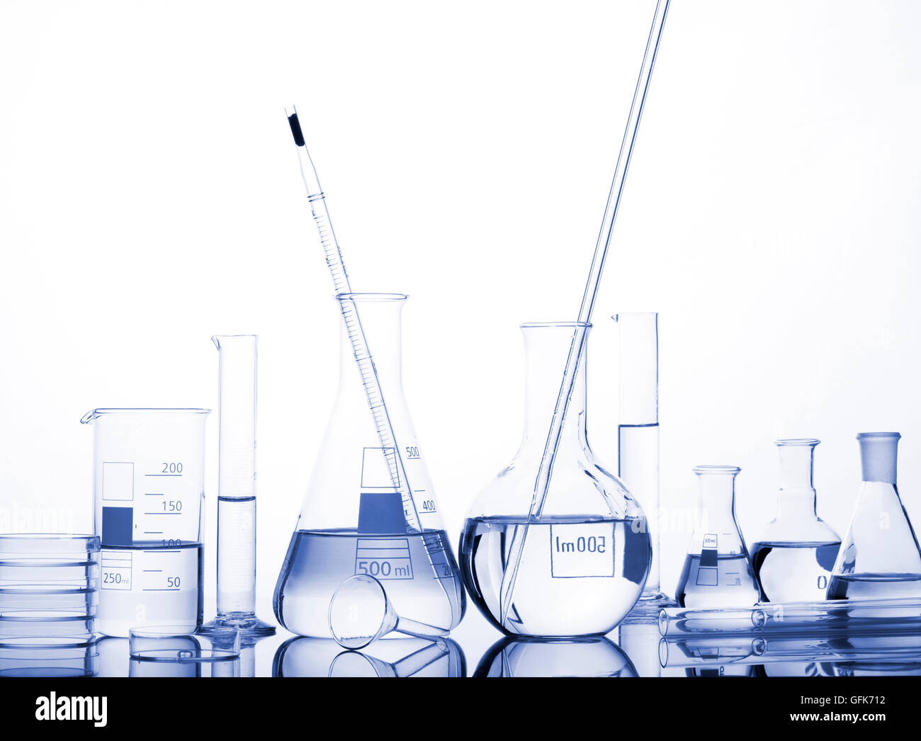 Test-tubes with reflections on a white and blue background. Laboratory ...