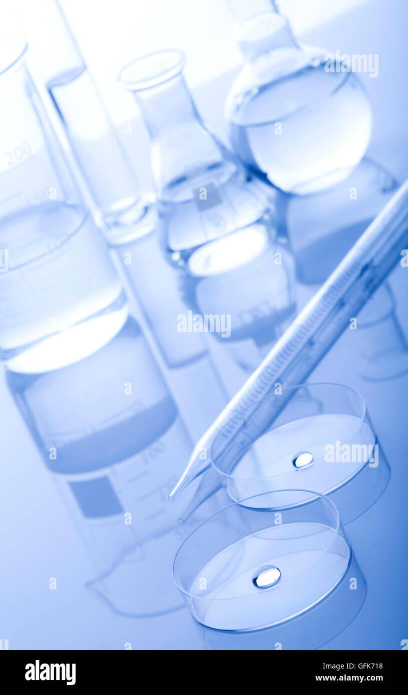 Test-tubes with reflections on a white and blue background. Laboratory ...