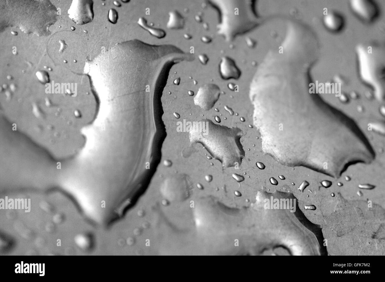 Water drops on scratched steel plate Stock Photo - Alamy