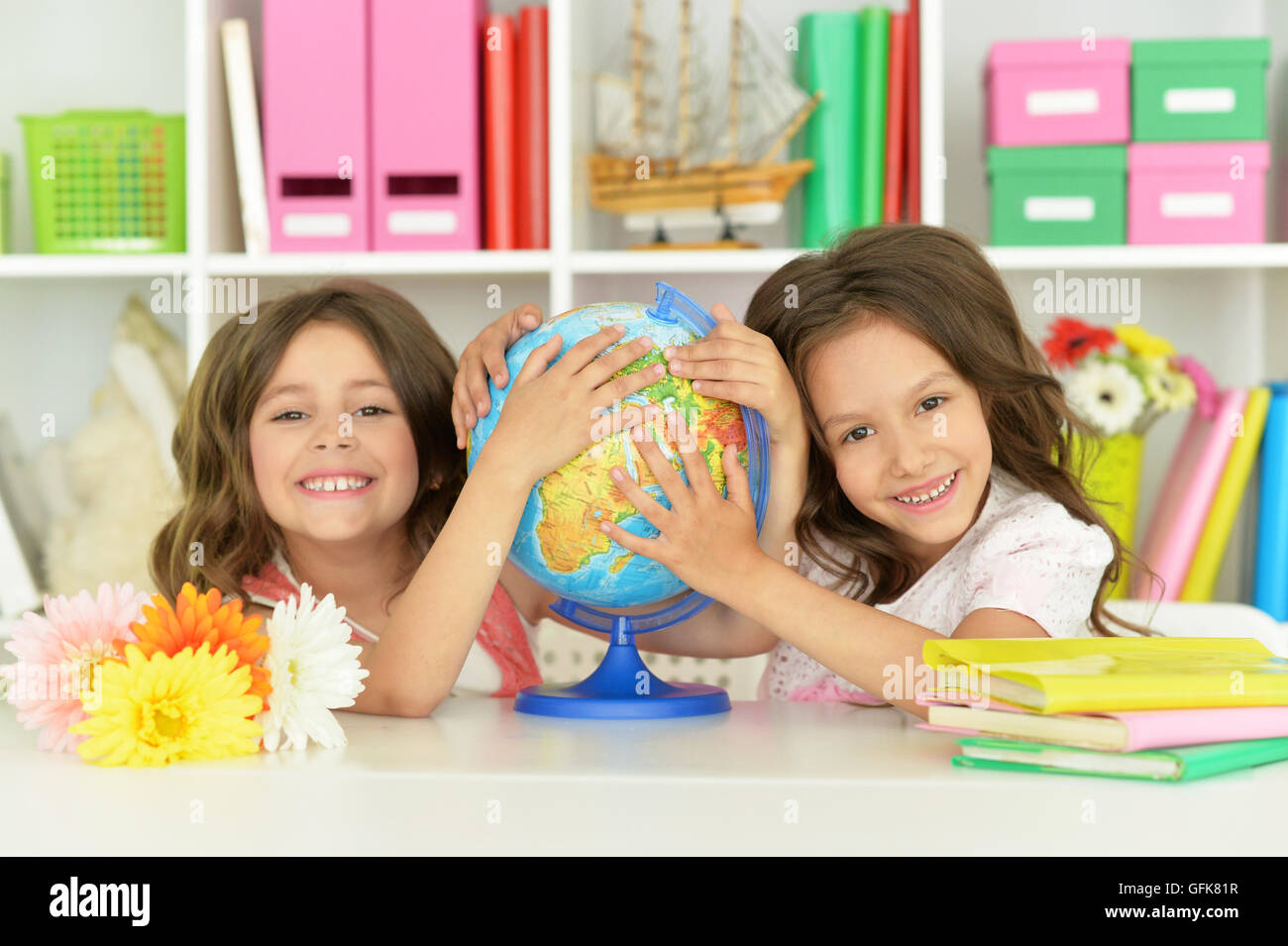 Cute girls on lesson Stock Photo - Alamy
