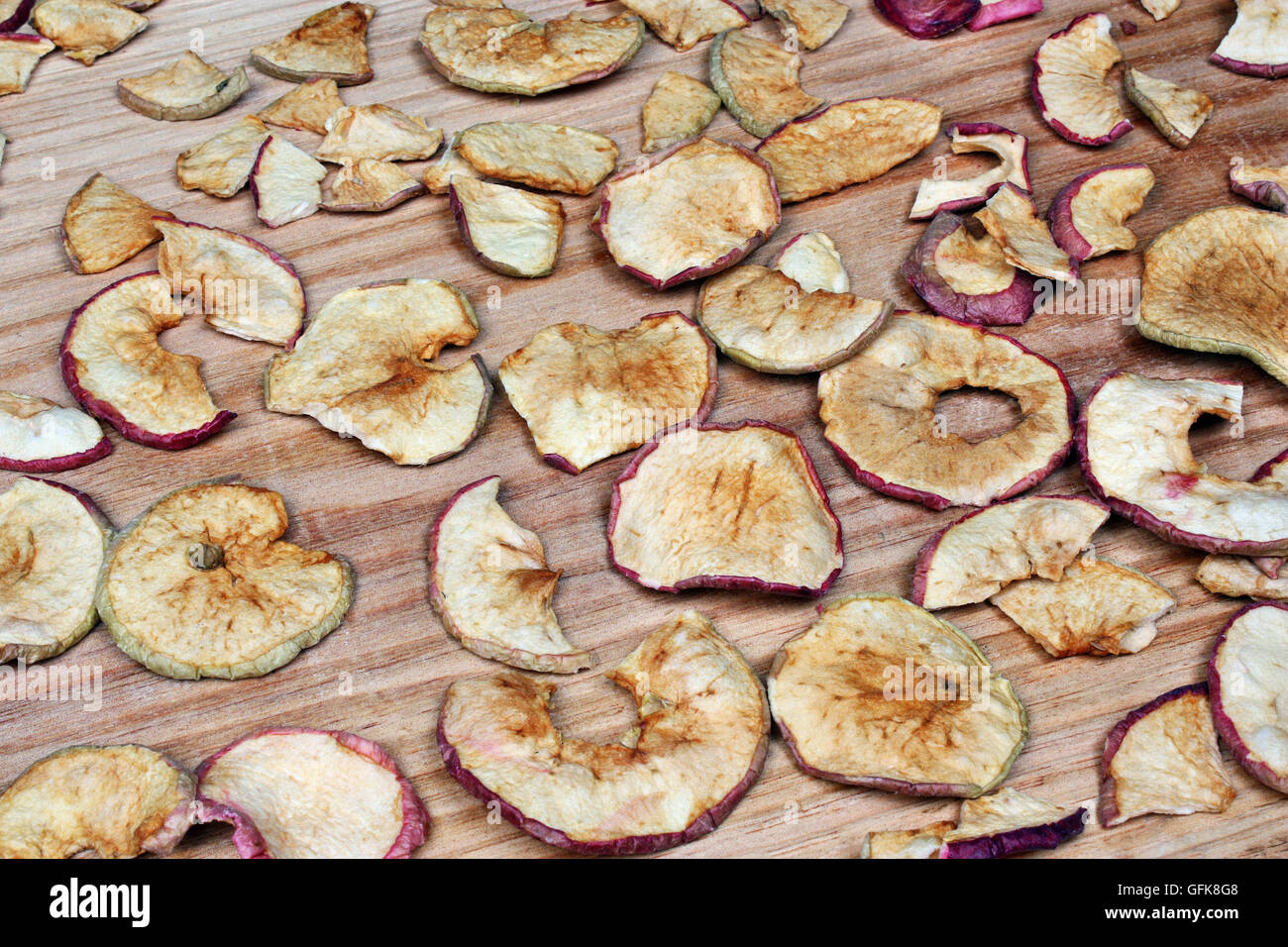 Dried apples chips, cut into round slices Stock Photo - Alamy