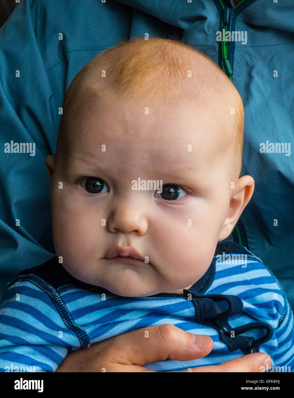 Baby in blue hi-res stock photography and images - Alamy
