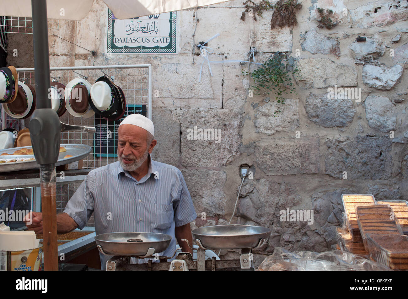 Israel, Jerusalem: a seller of hat and sweets at Damascus Gate, one of ...