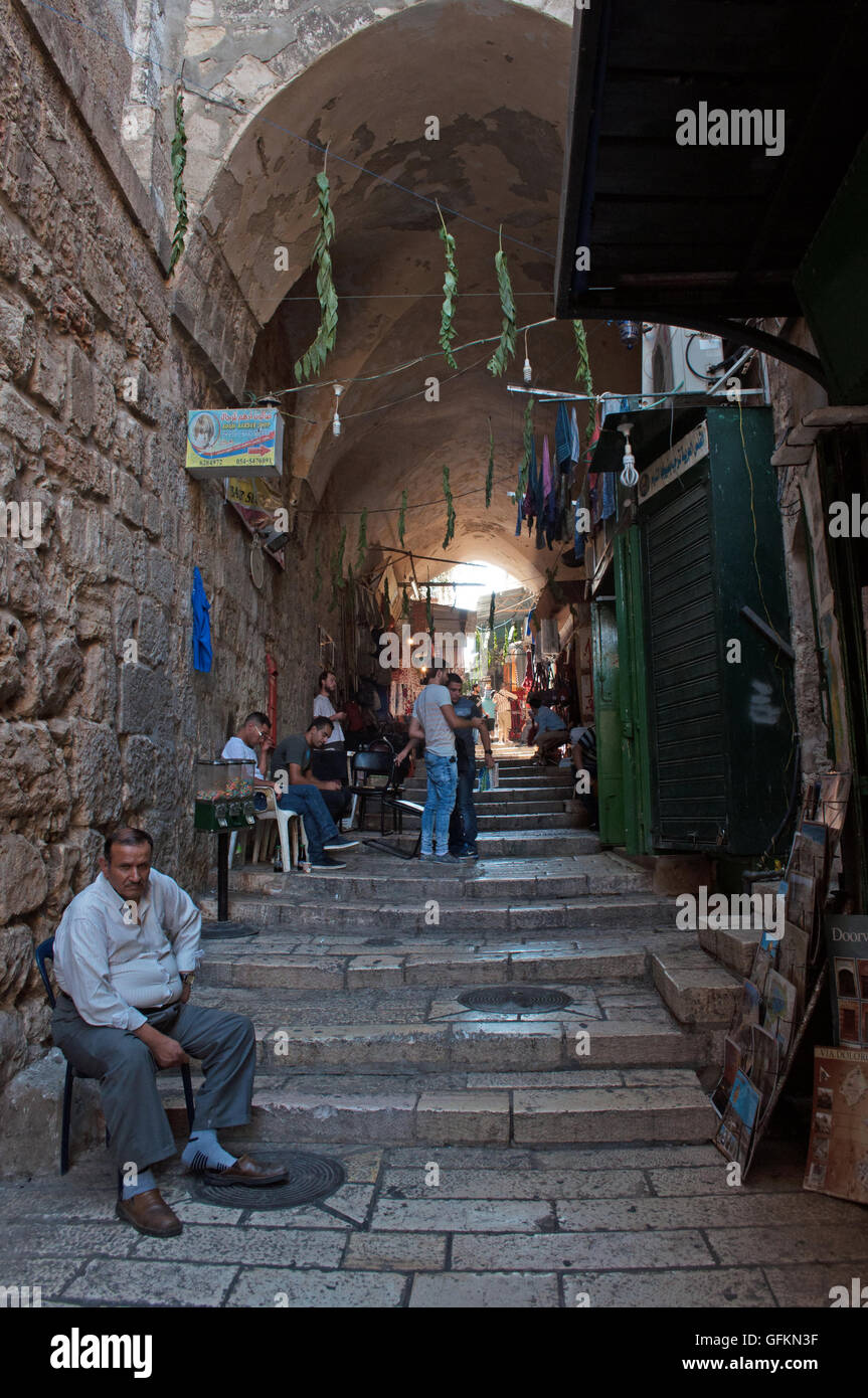 Jerusalem, Israel, Middle East: people in the alleys of the Old City, a ...