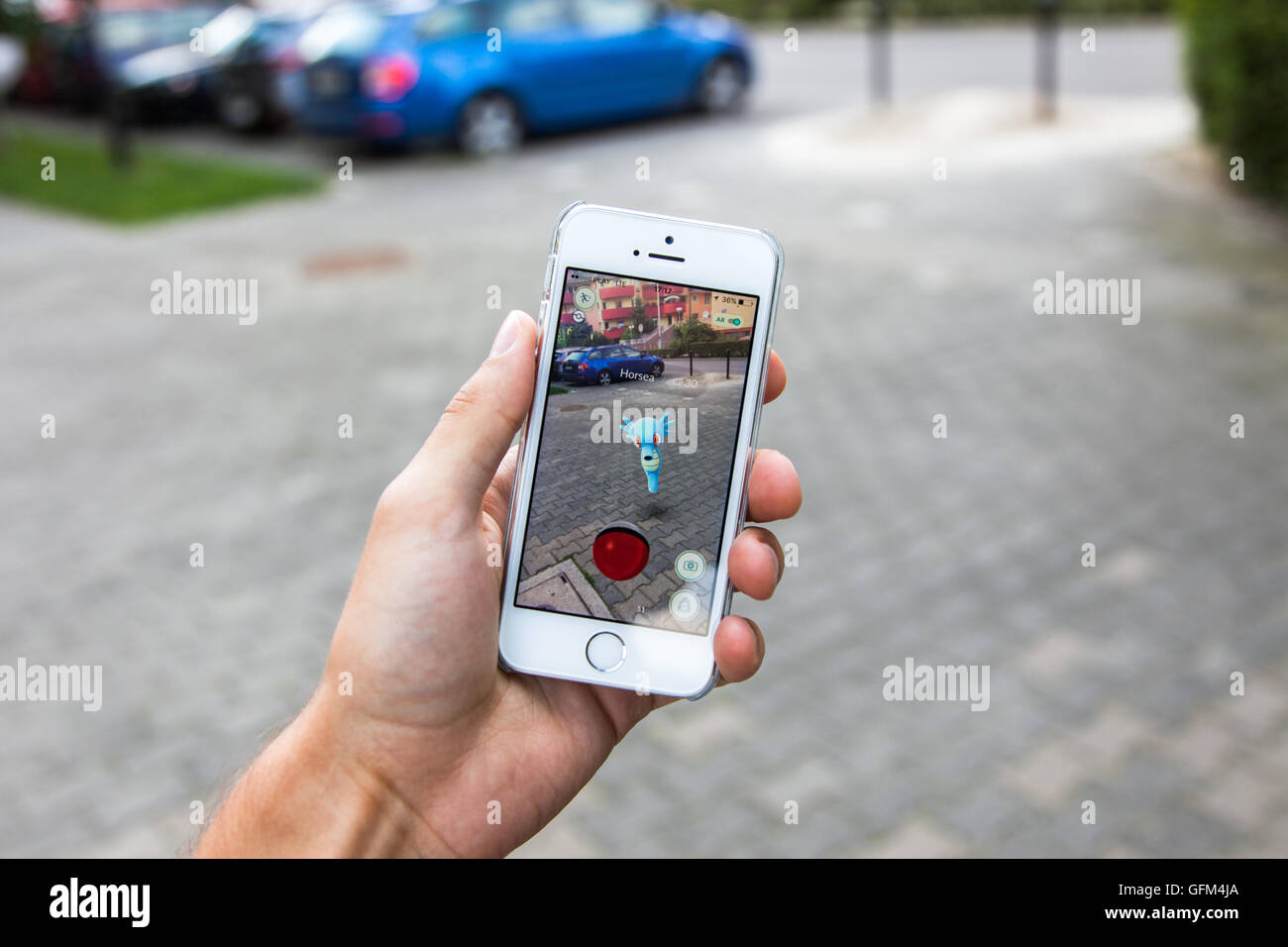 Pokemon Go game on screen of iPhone Stock Photo - Alamy