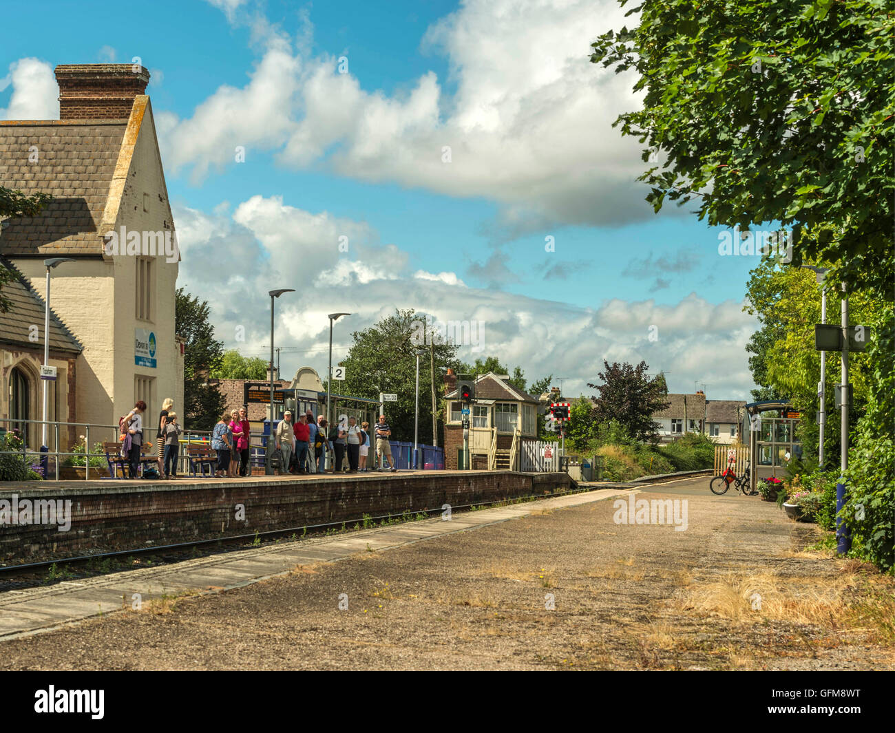 Passengers wait for a First Great Western Train to arrive at pretty ...