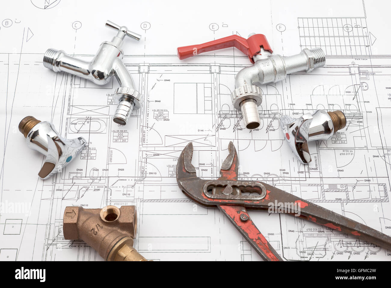 Plumbing Tools Arranged On House Plans whit wrench and water valves ...