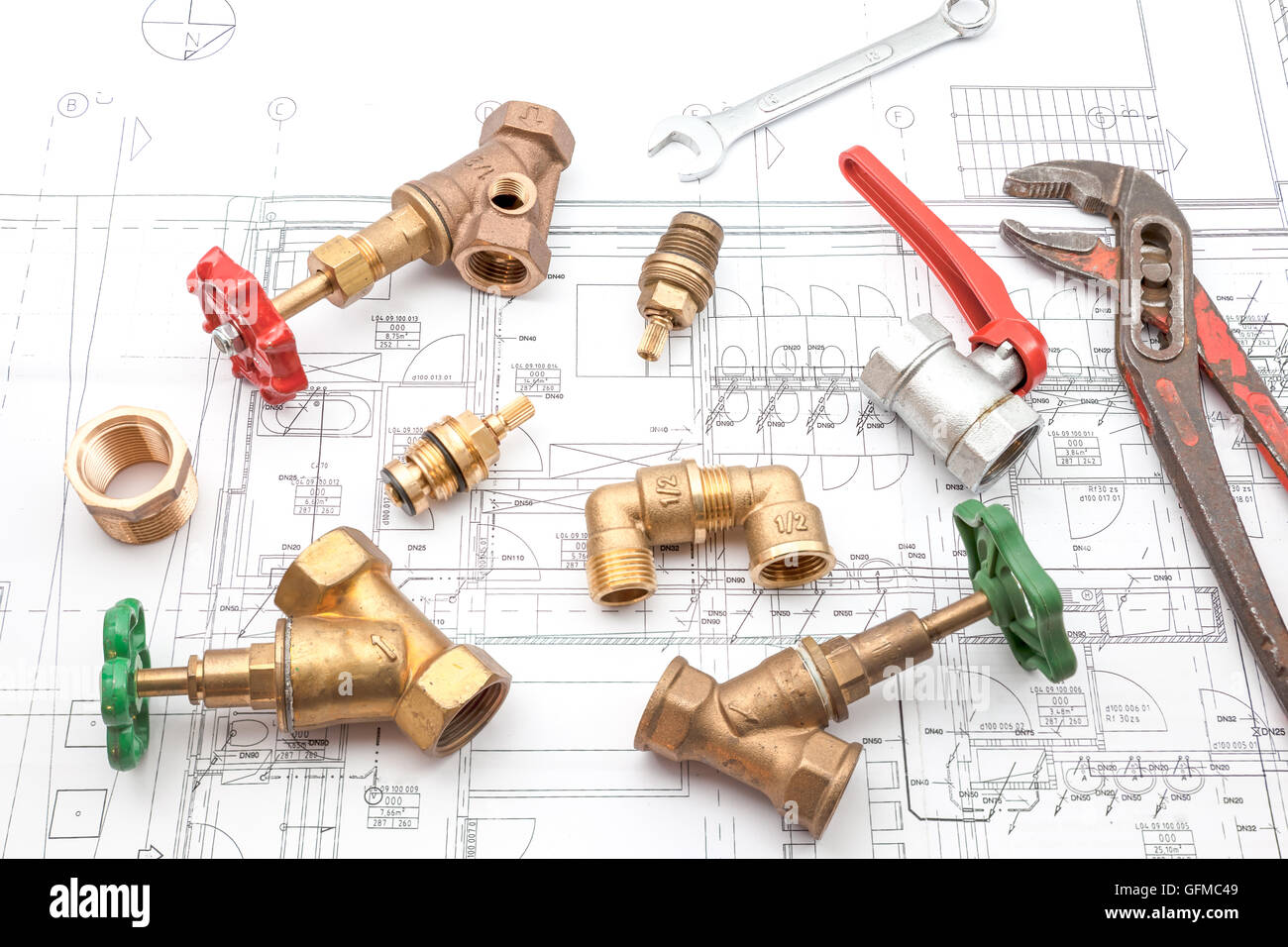 Plumbing Tools Arranged On House Plans whit wrench and water valves ...